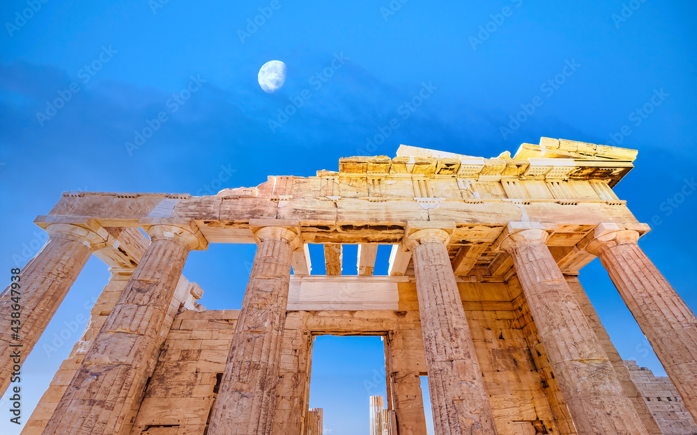 Athens Greece, moon is still on the morning sky over "propilei ...