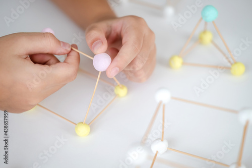 STEM education, Child learning making 3D geometric shapes, Building ...