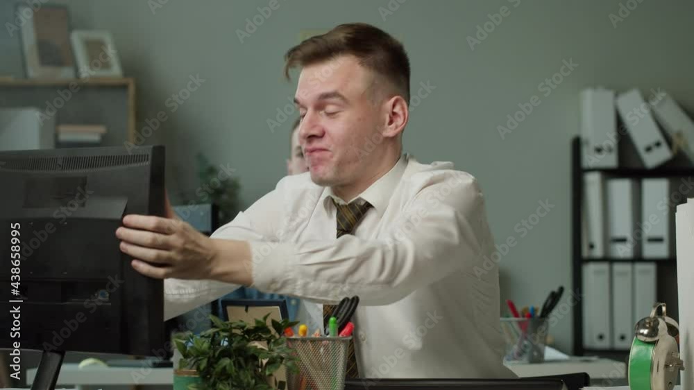 Video Stock Irritated shocked worker knocking and shaking the steaming ...