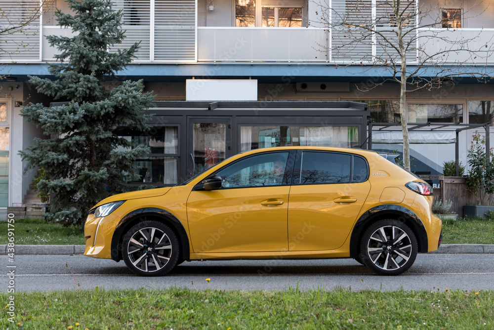 New Peugeot 208 GT Line in bright yellow colour. New 2020. year model ...