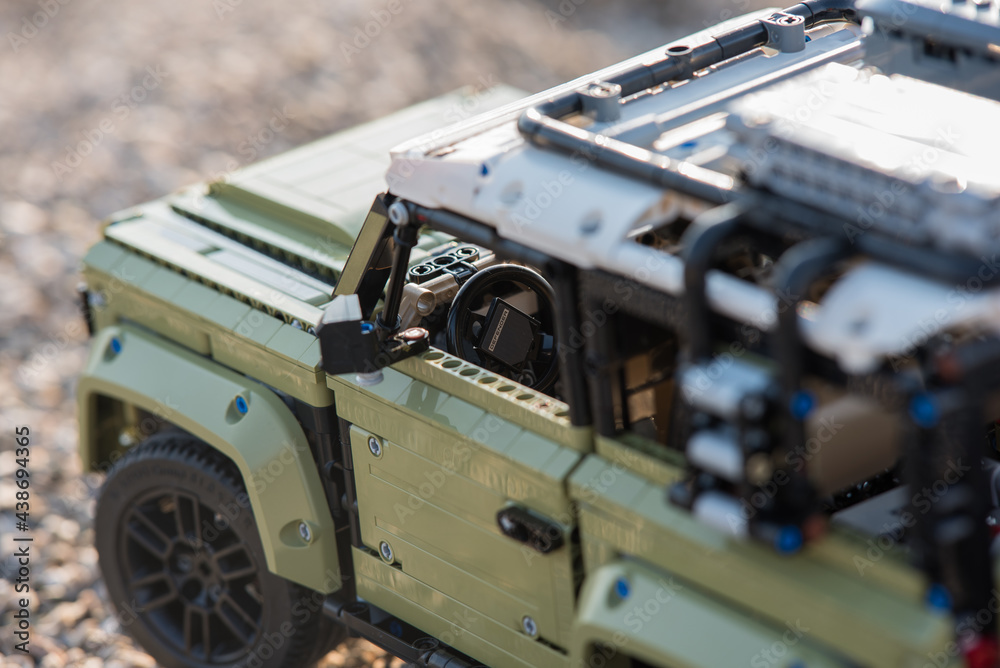 Lego set as road vehicle Land Rover Defender in nature. Lego bricks as ...