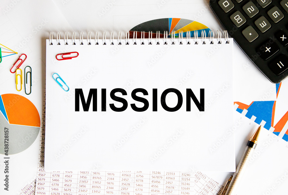 In the notebook, mission text, next calculator, pen, diagrams and ...