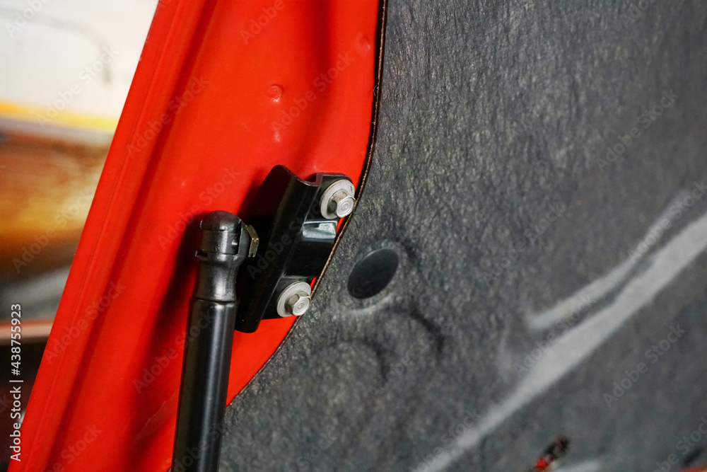 red car trunk shock absorber close-up foto de Stock | Adobe Stock