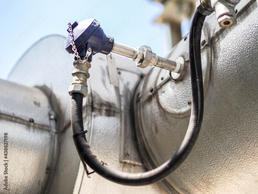 Temperature sensor for measuring instrument close up in industry zone ...