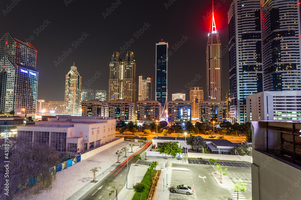 Dubai, UAE – april 18, 2021: night view on Ama Tower, Aspin Commercial ...