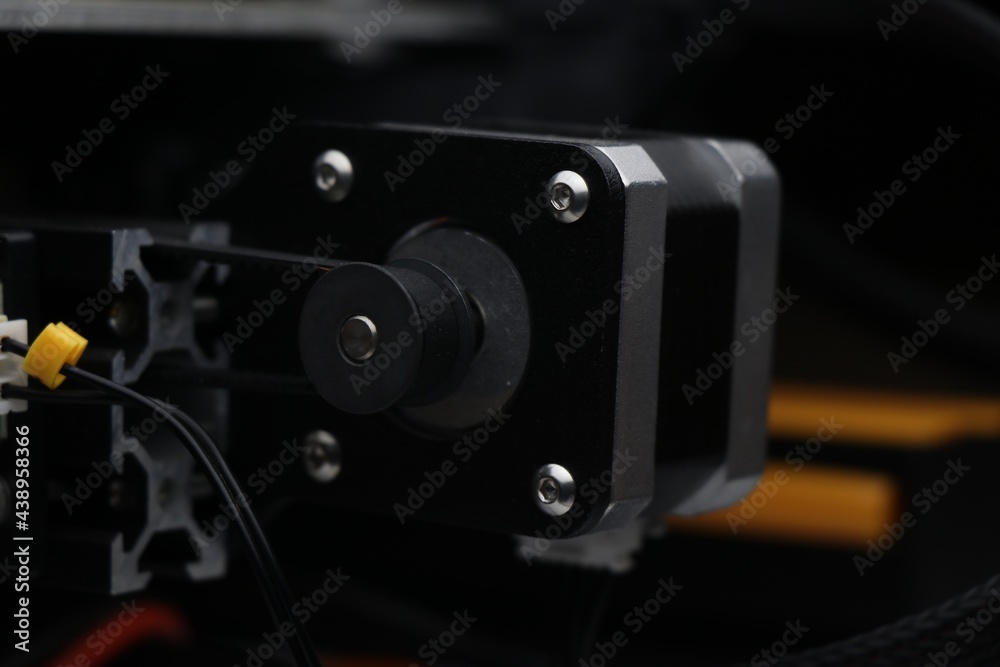 Side view of stepper motor driven heating or printing bed of three ...