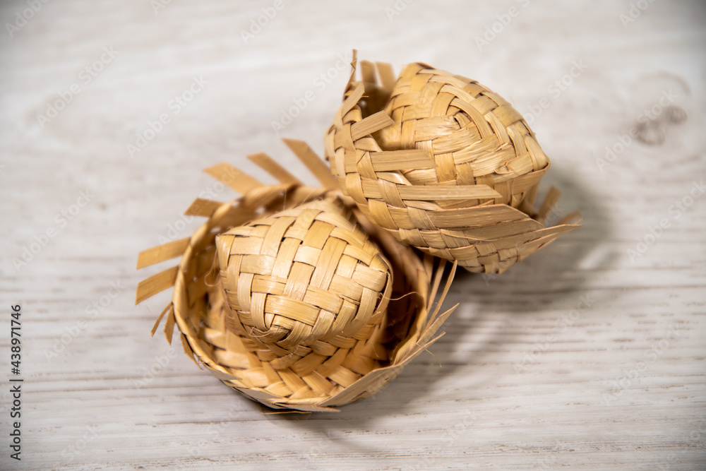 Straw hat on a wooden background. Traditional object used in the June ...