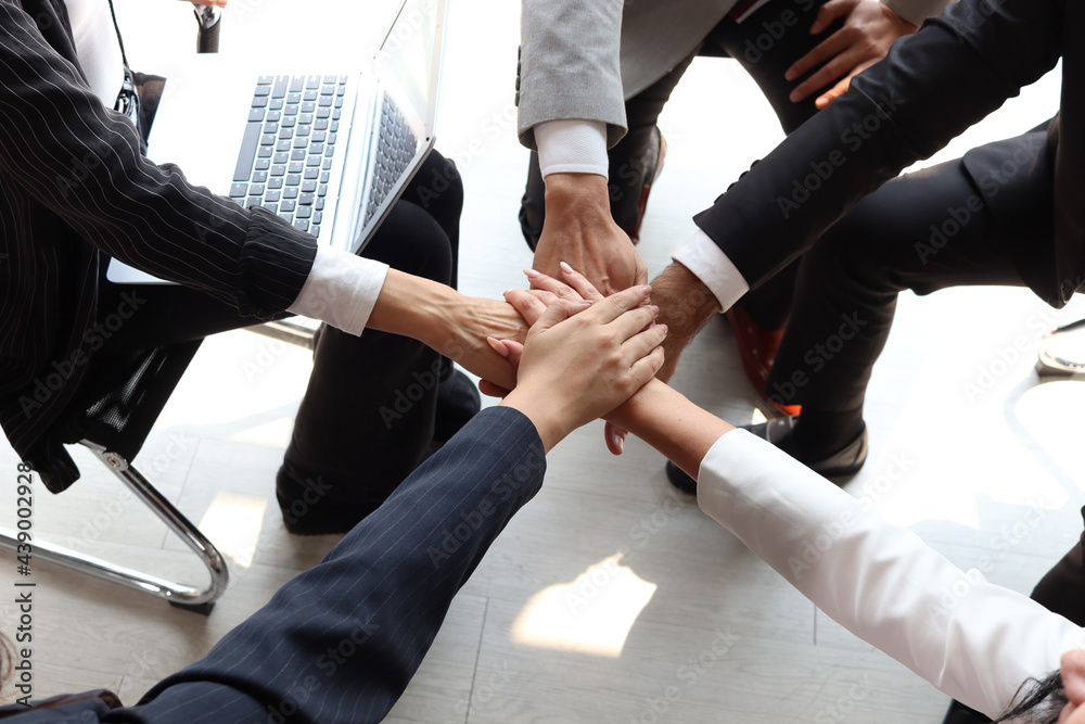 businessman and woman putting hands join together, business partnership ...