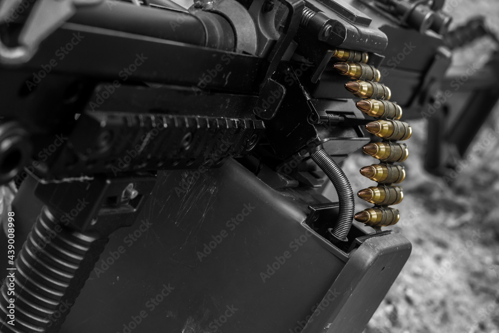 M249 light machine gun with 7.62 mm cartridge belt black and white ...
