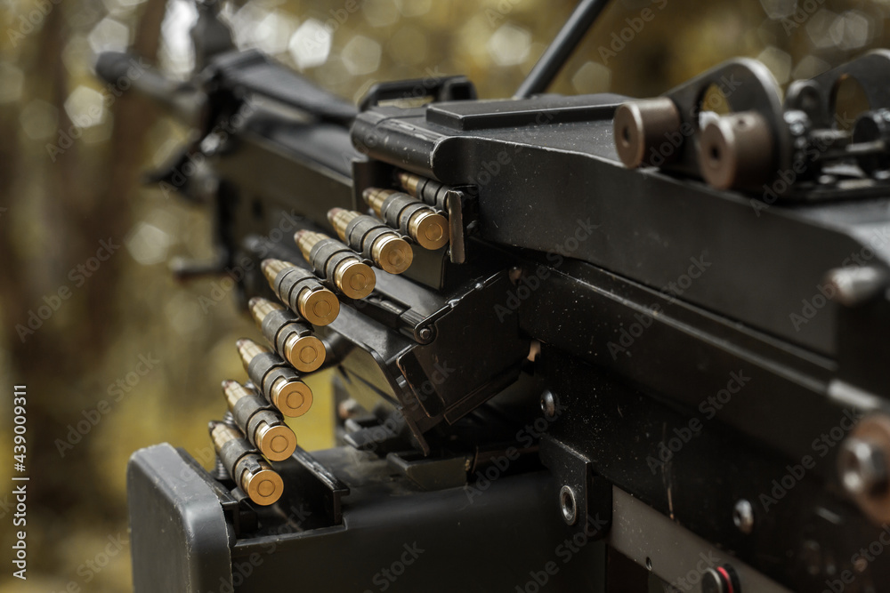 M249 light machine gun with 7.62 mm cartridge belt black and white ...