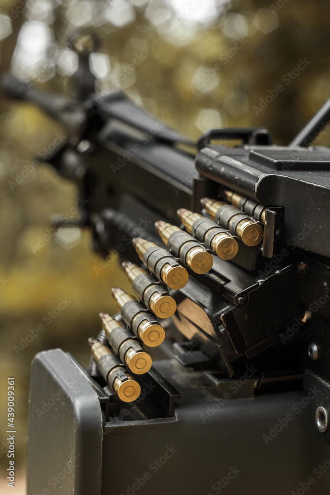M249 light machine gun with 7.62 mm cartridge belt black and white ...