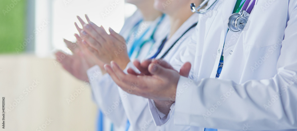 Medical team clapping their hands during a meeting Stock Photo | Adobe ...