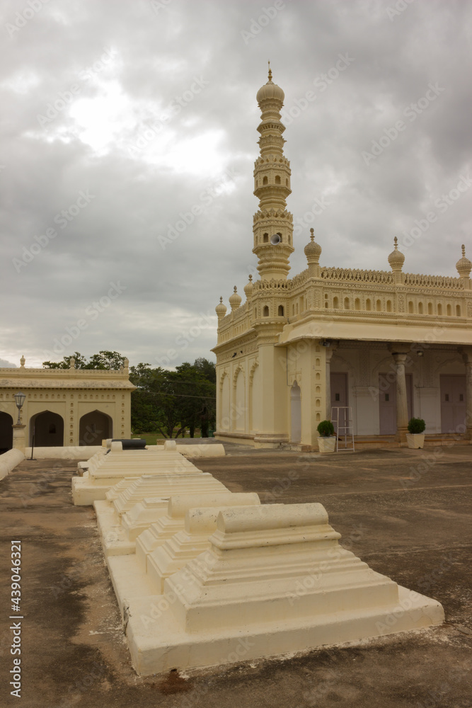 A magnificent picture of a few tombs and an Islam mosque minarets of ...