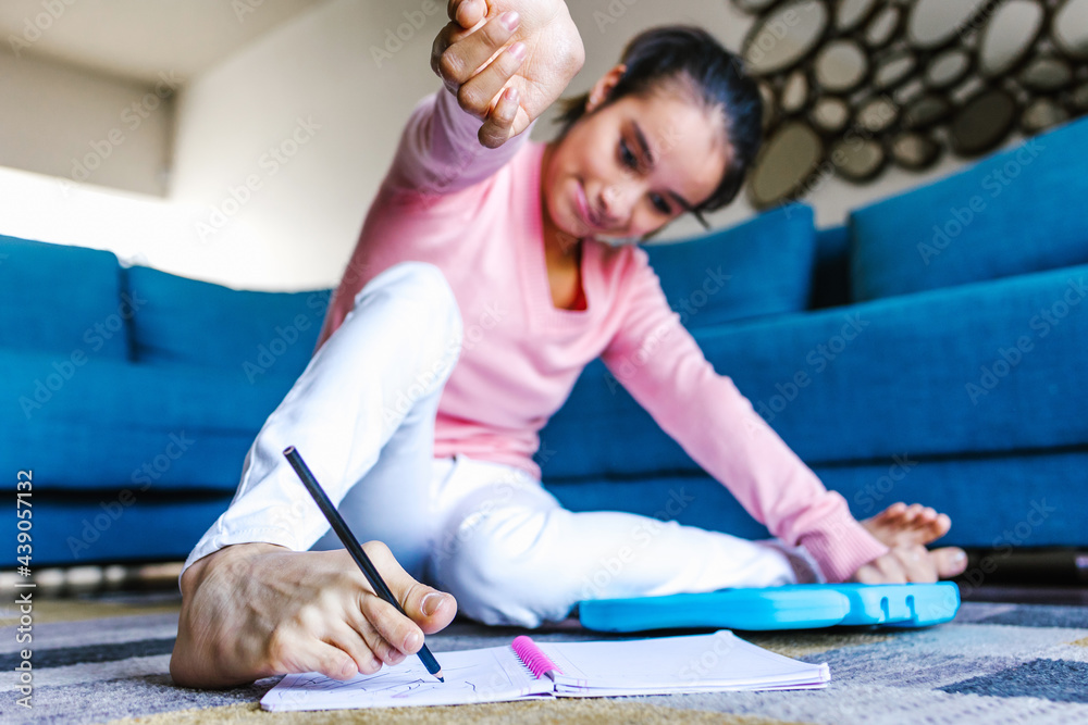 disabled mexican girl with cerebral palsy developing writing skills ...