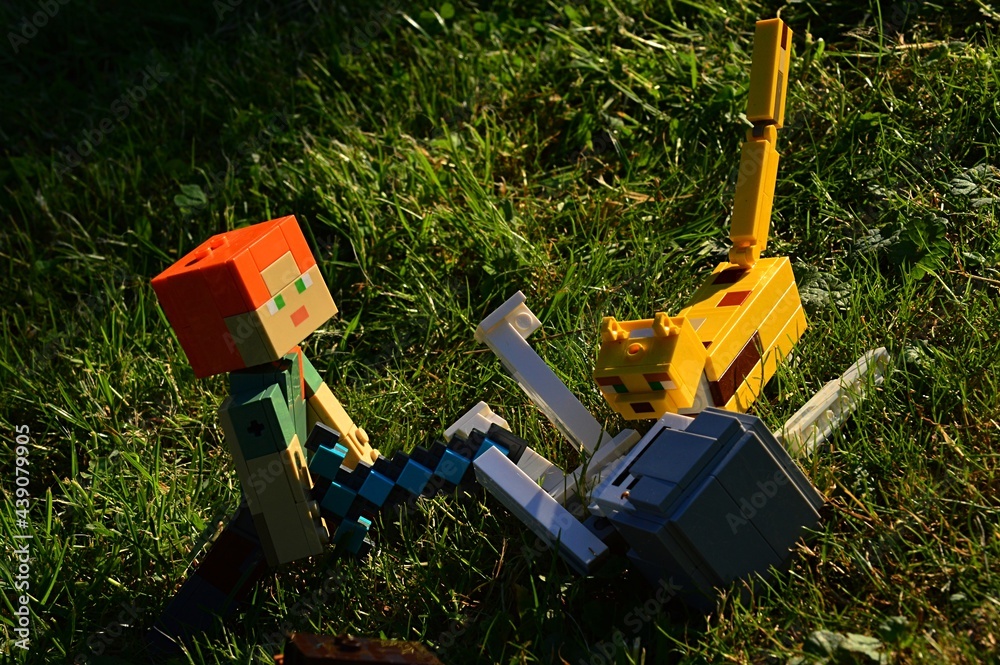 LEGO Minecraft fight scene on garden lawn - Alex with diamond sword and ...