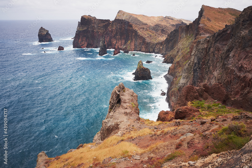 East Madeira coast landscape view with cliffs, rocks and sea. Ponta de ...