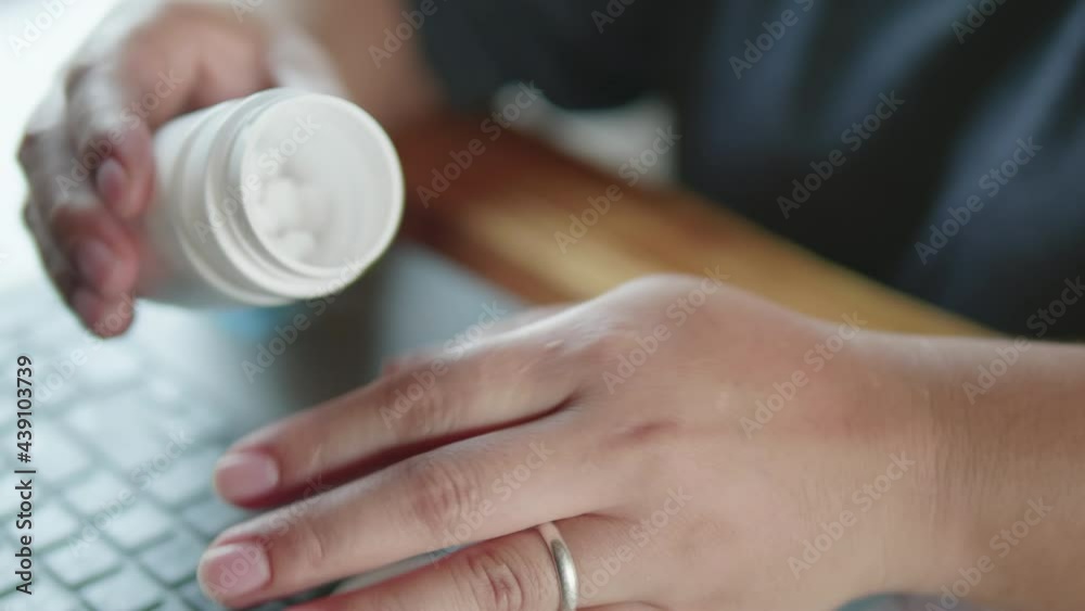 B roll of Treatment with drug tablets. Hands shake the drug tablets ...