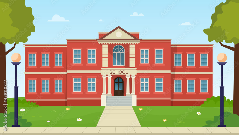 School building facade with green grass and trees. Public educational ...