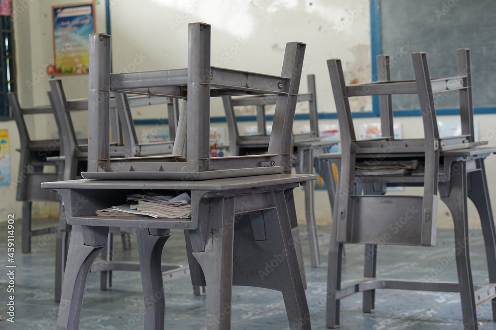 Student desks and chairs are made of plastic in the classroom. Stock ...