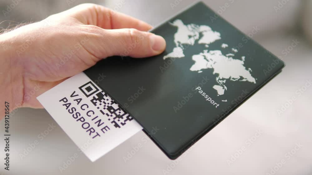 Passport with Vaccine Covid-19 safety certificate on QR Code in 4k slow ...