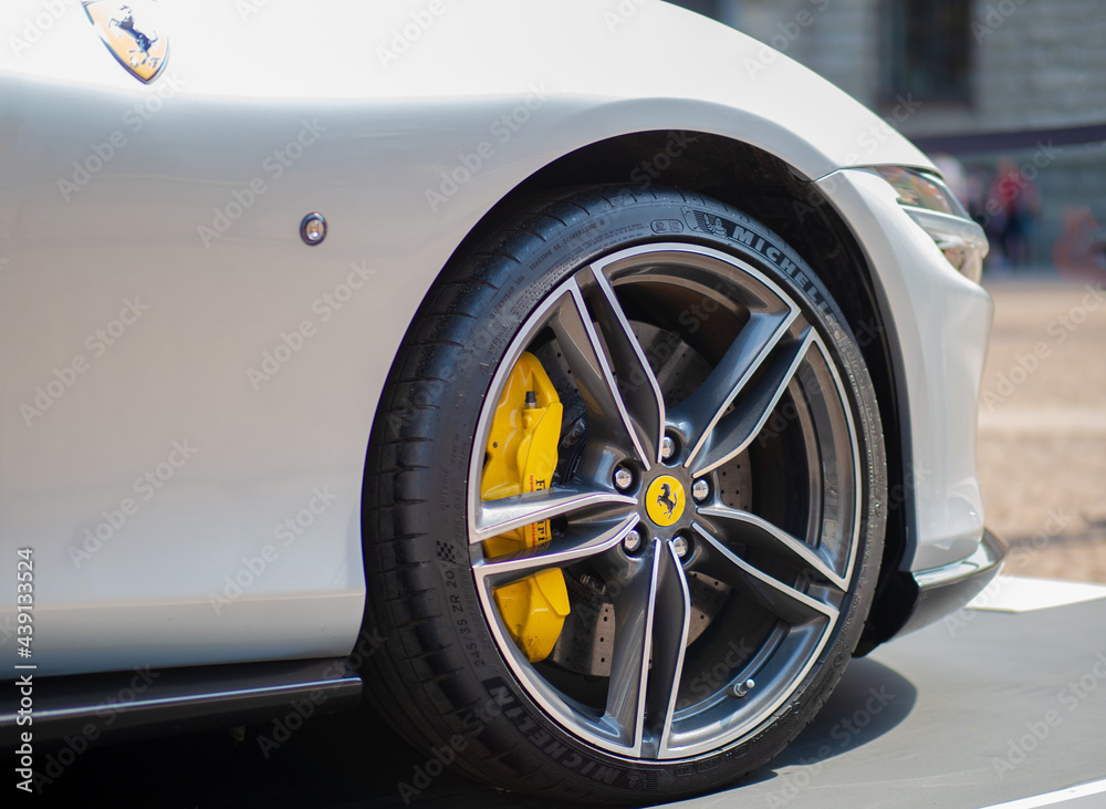 Logo of prancing Horse on the front wheel with yellow brake calliper of ...