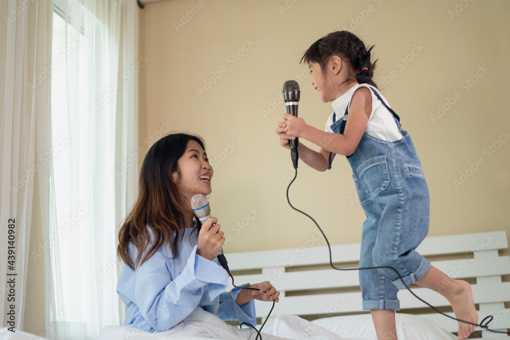 Happy Asian family loving children, kid and her sister holding ...