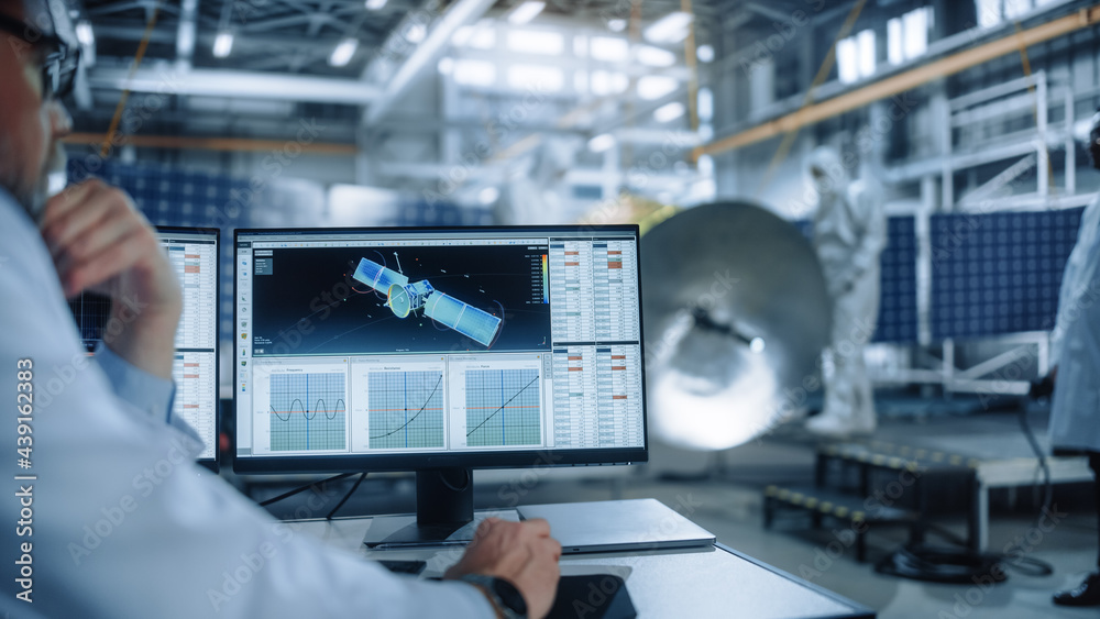 Team of Engineers Working on Satellite Construction. Aerospace Agency ...