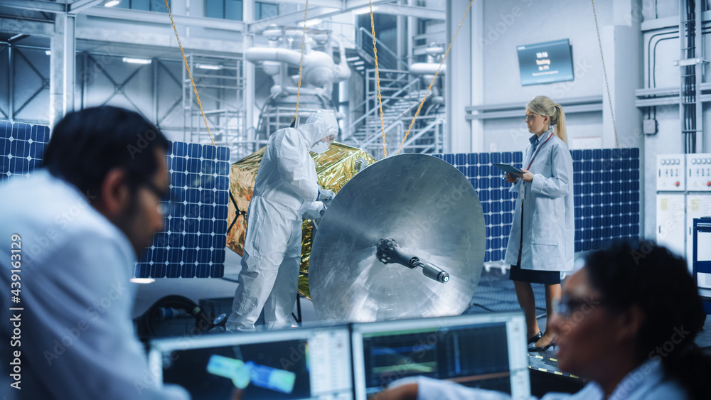 Female Engineer uses Computer to Analyse Satellite, Calculate Orbital ...