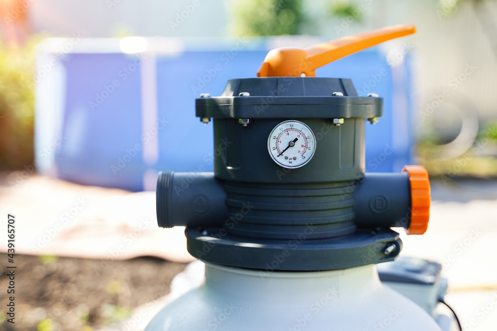 Pressure gauge measuring water pressure in a sand pump of an outdoor ...