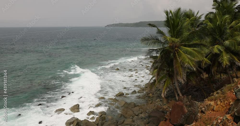 Cape Three Point Ghana tropical palm trees rocky ocean coast ...