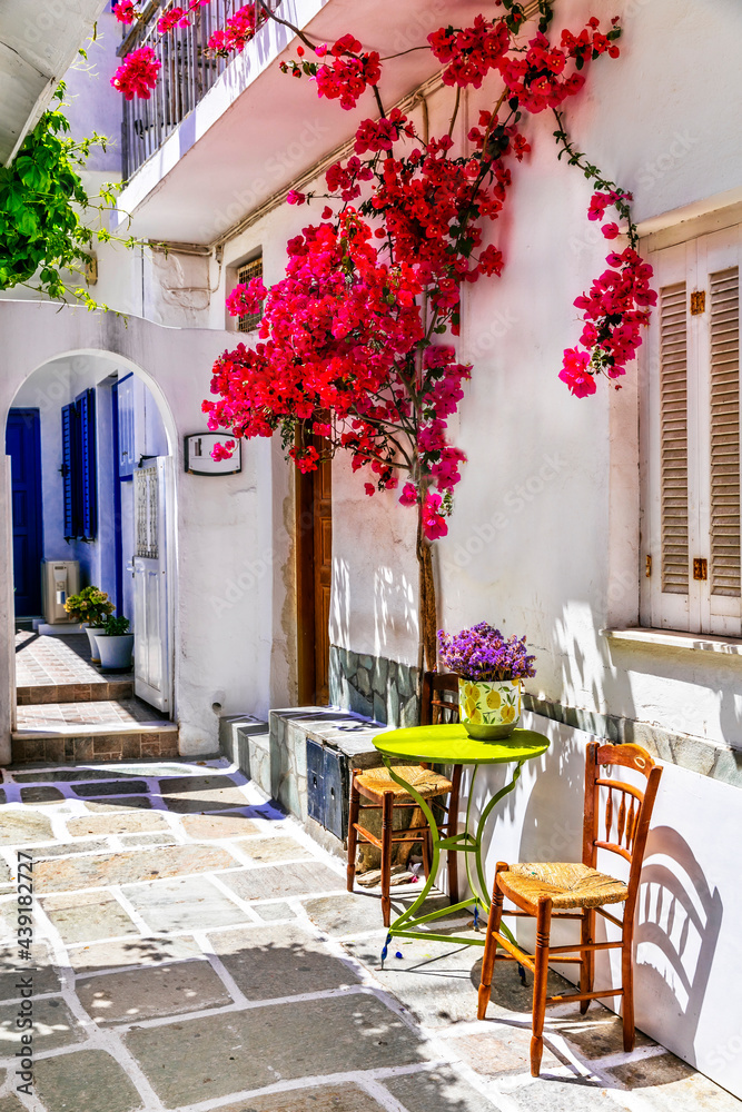 Charming narrow typical streets of Greek islands. Ios, Chora town with ...