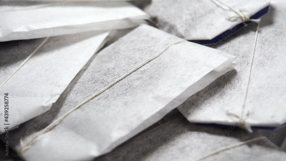Vidéo Stock Paper tea bags. Macro shot. Rotation. Textured porous ...