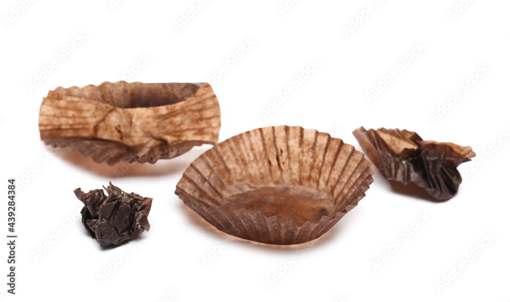 Crumpled, empty chocolate and cupcake wrapping paper garbage for ...