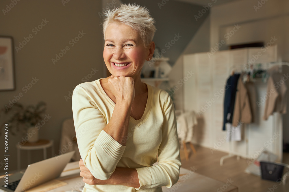 Portrait of charming attractive female boomer with short hairstyle ...
