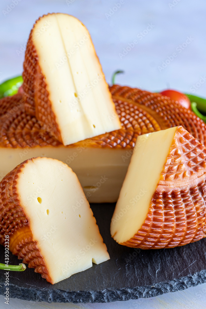 smoked cheddar cheese. rustic cheese. Sliced smoked cheese. gourmet ...