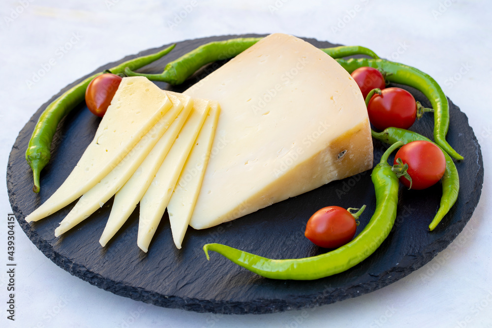 Kashar cheese or kashkaval cheese. Sliced Cheddar Cheese. gourmet ...