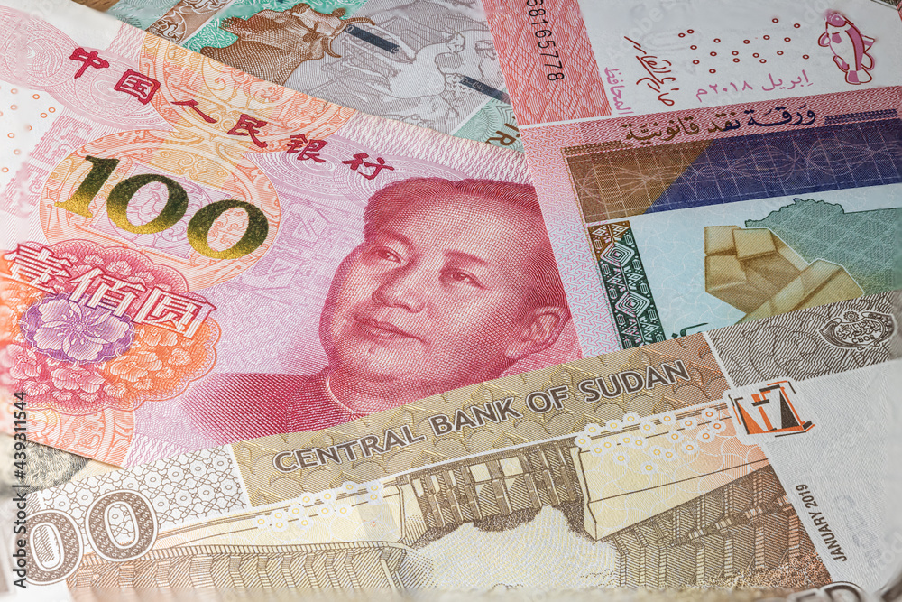 Close up to 100 Yuan of the People Republic of China between sudanese ...