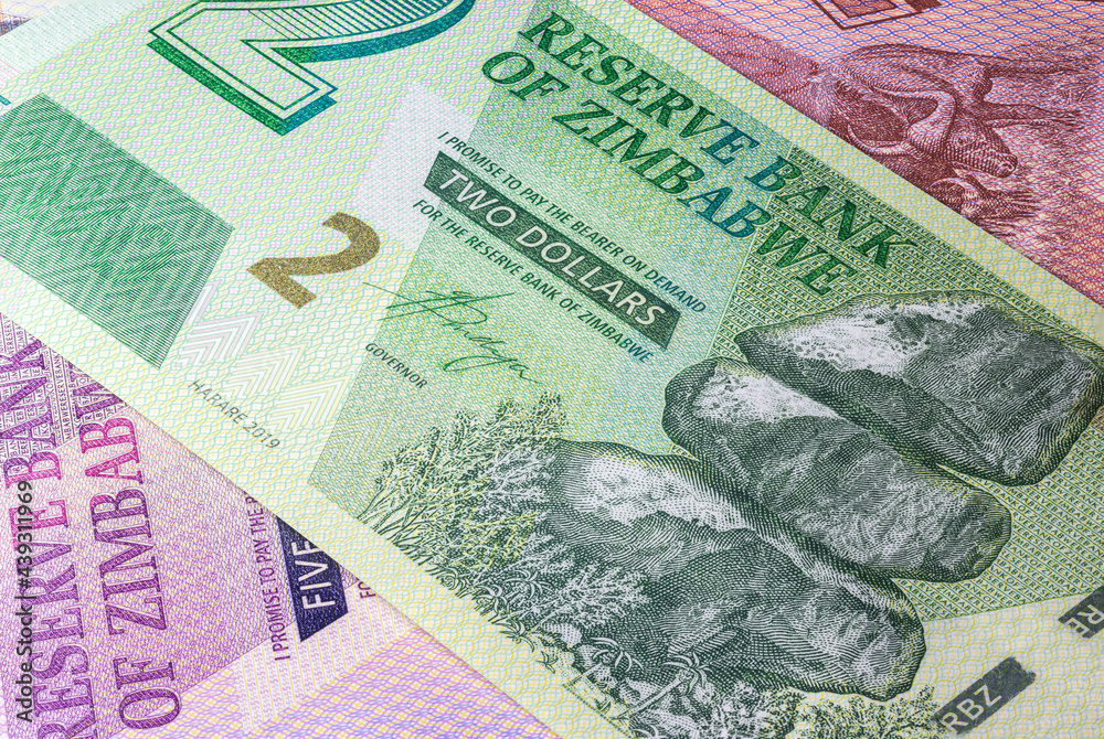 Close up to two Dollars of the Republic of Zimbabwe. Paper banknotes of ...