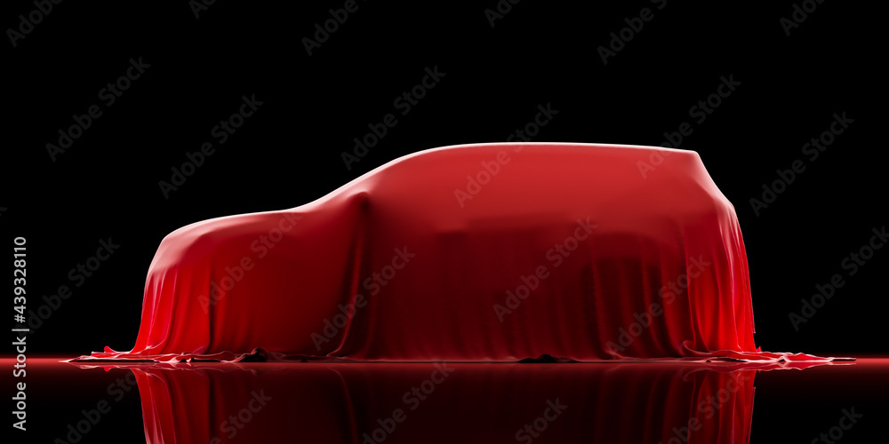 The SUV car is covered with red cloth on a black background. Side view ...
