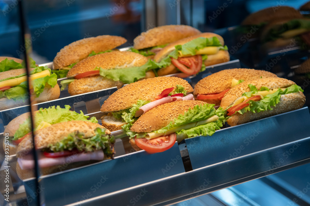 Group of different sandwiches made from sesame buns with various type ...