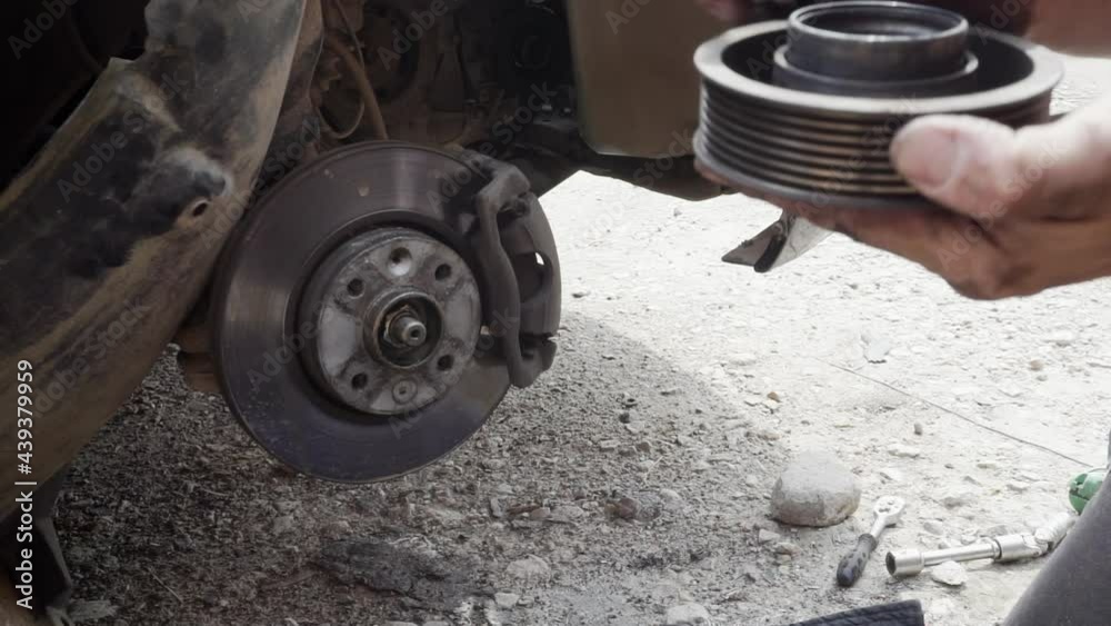 Inspection of a faulty part when repairing a car Stock Video | Adobe Stock