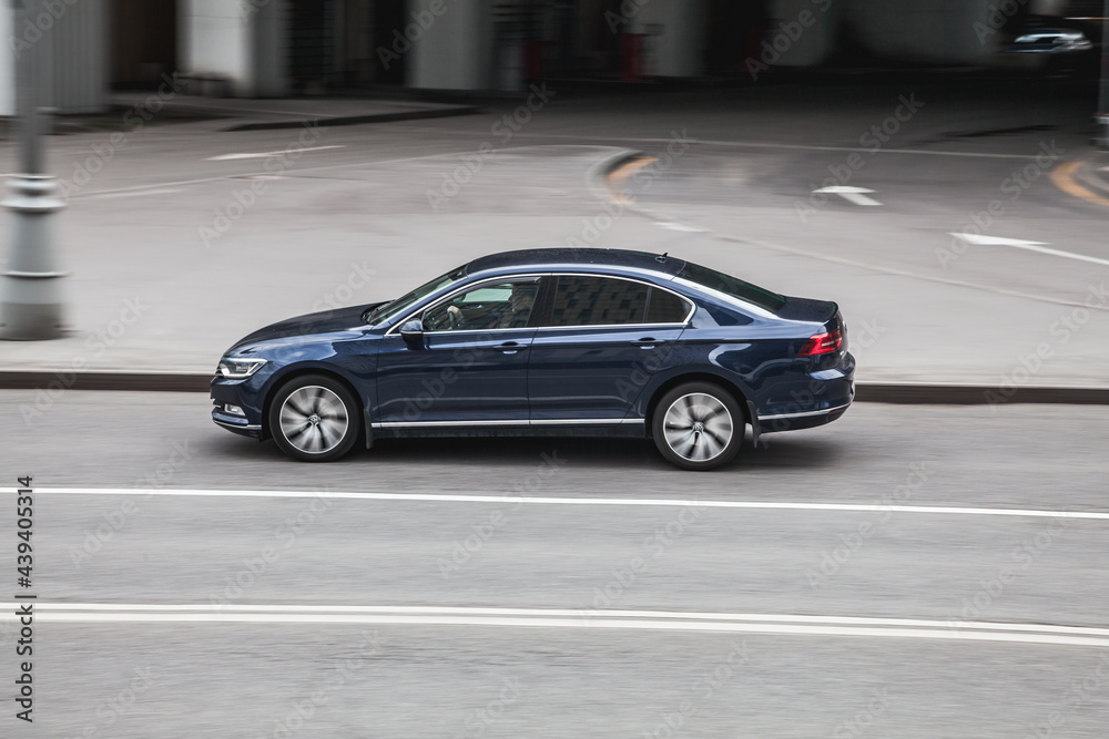 Car driving fast motion on the highway, side view. Gray Volkswagen ...