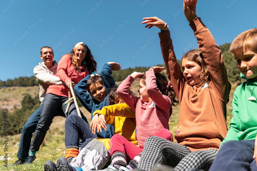 Excited kids playing in nature Stock Photo | Adobe Stock