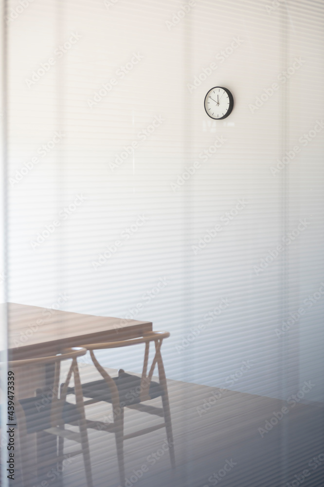 Clock on the wall of meeting room Stock Photo | Adobe Stock