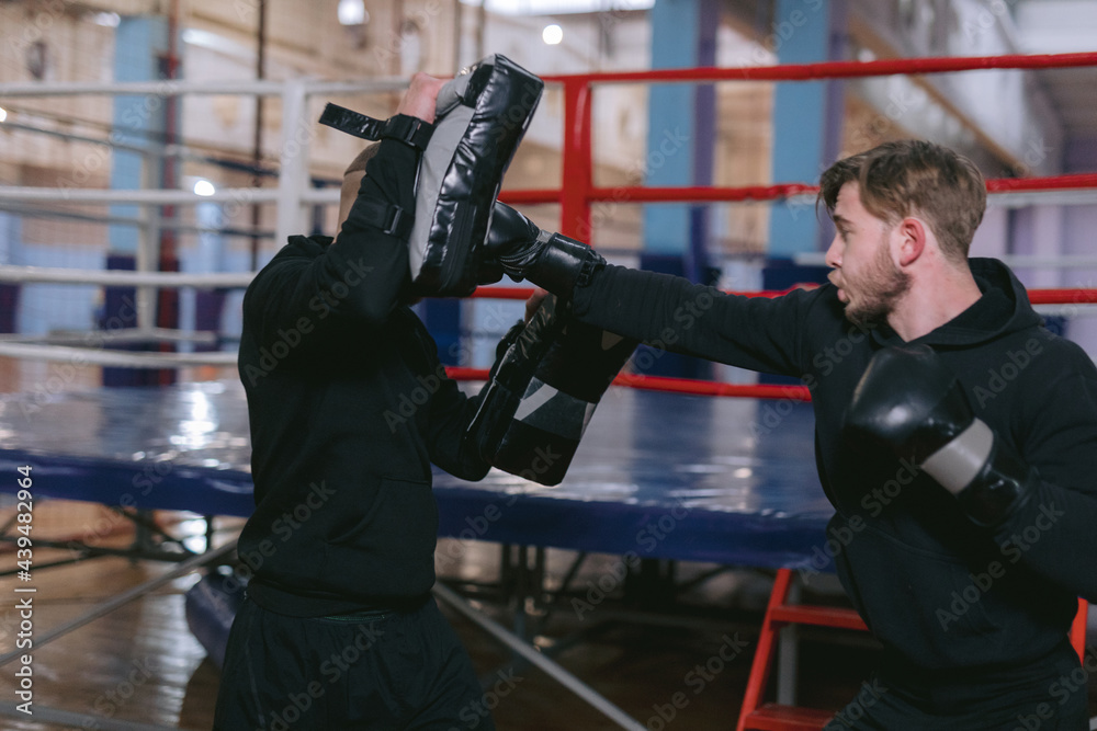 Professional boxer having intensive training before competition Stock ...