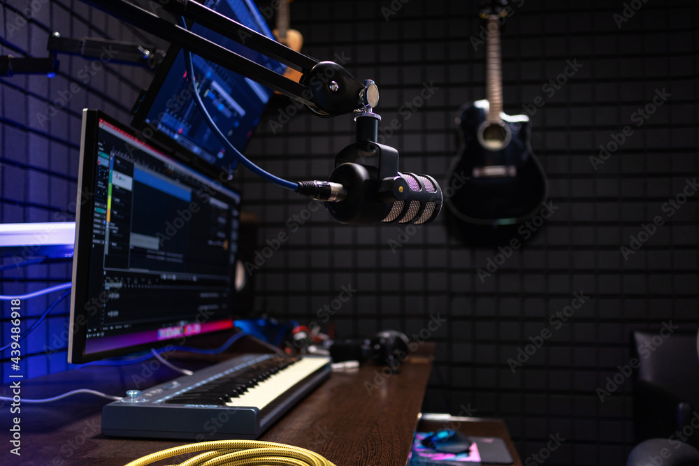 Modern music recording studio equipment. Computer screen showing user ...