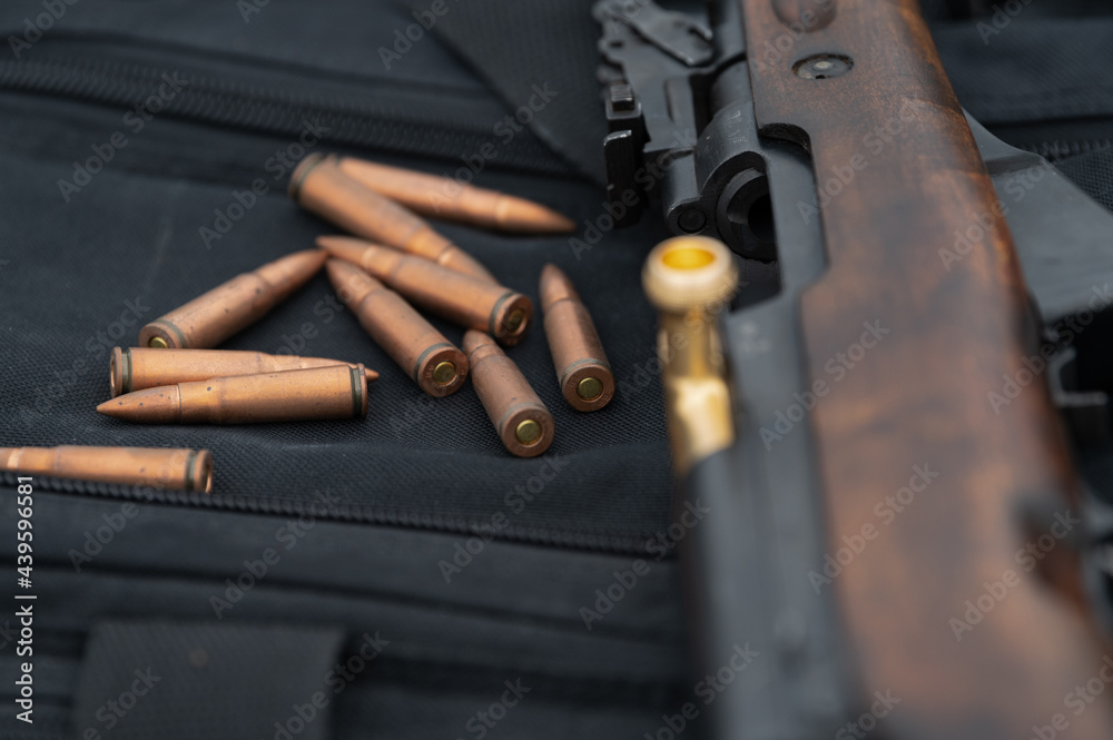 SKS Rifle with ammunition in focus Stock Photo | Adobe Stock