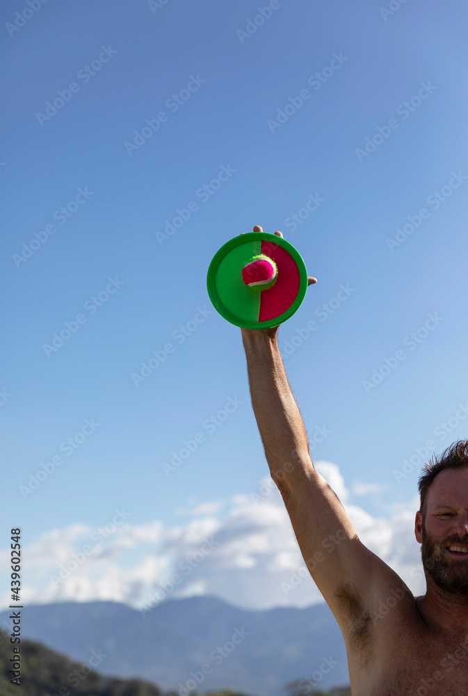 Man catching Ball caught on Velcro Glove Stock Photo | Adobe Stock