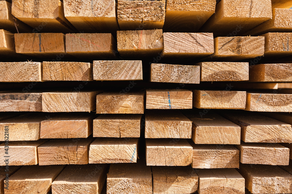 a stack of wooden boards, wooden boards at a sawmill, a warehouse of ...