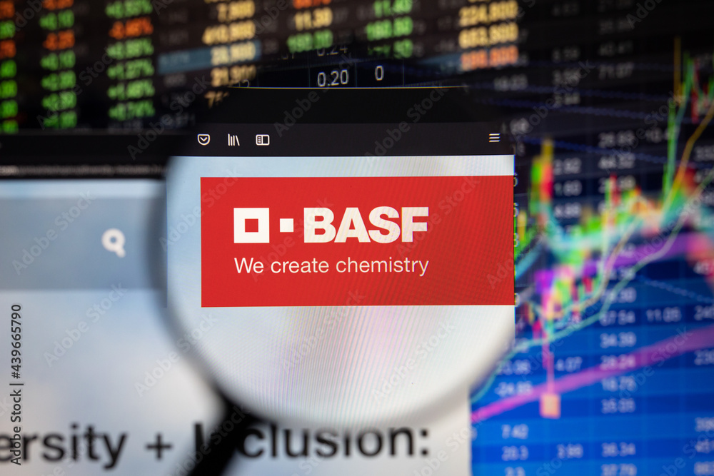 BASF company logo on a website with blurry stock market developments in ...